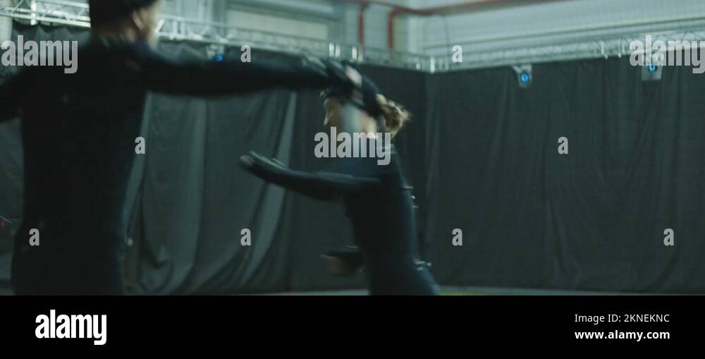 Actors in motion capture suits performing some fight moves as game ...