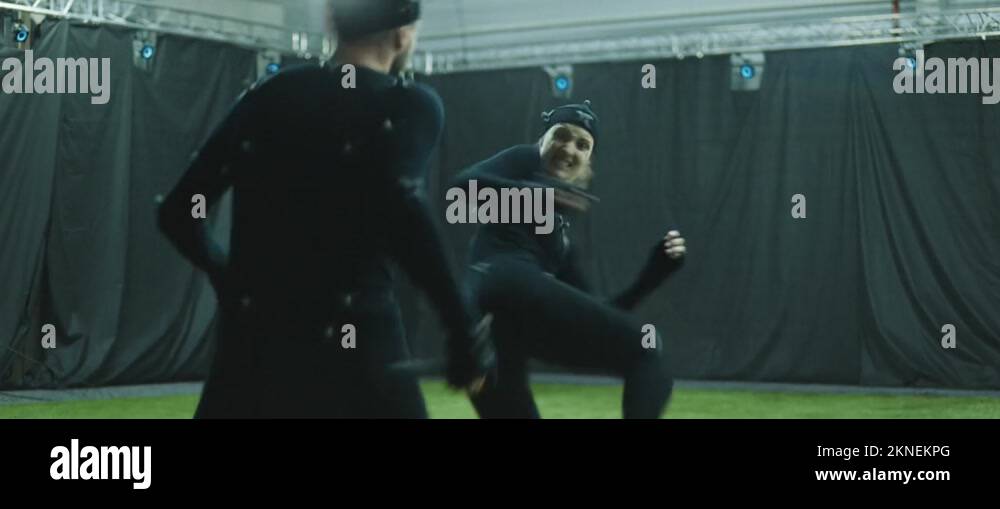 Actors in motion capture suits performing some fight moves as game ...