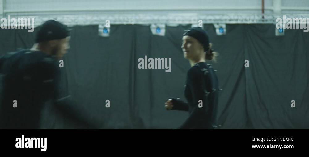 Actors in motion capture suits performing some fight moves as game ...