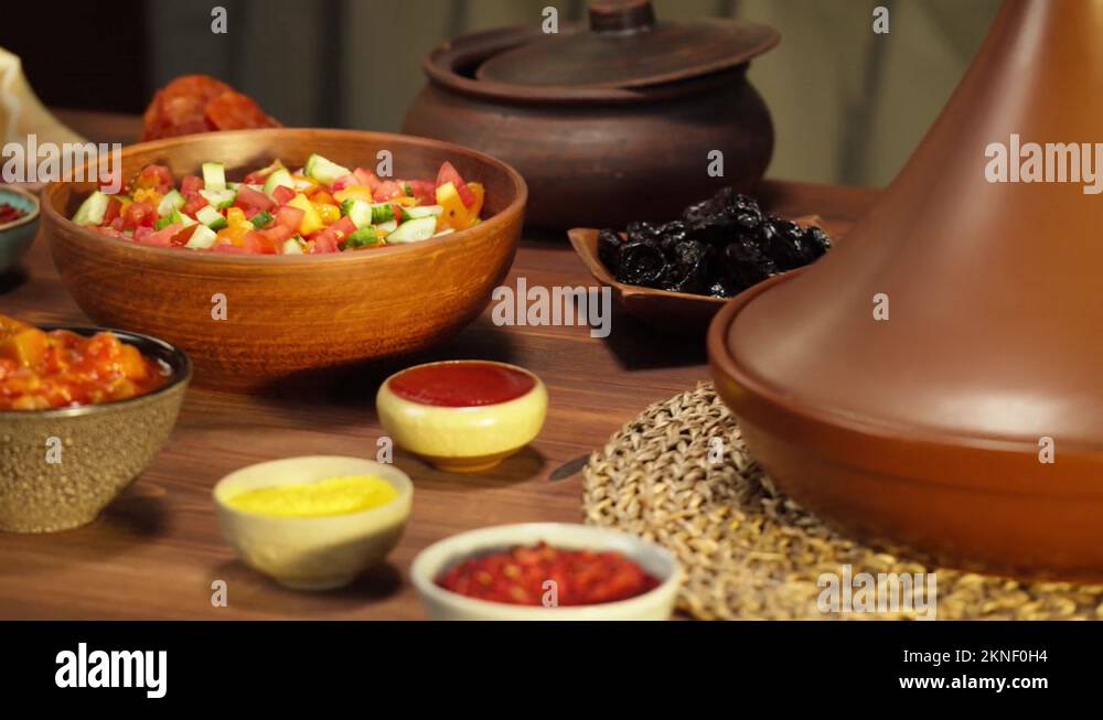 Moroccan cuisine. Tajine, traditional dish made of lamb and eggplant ...