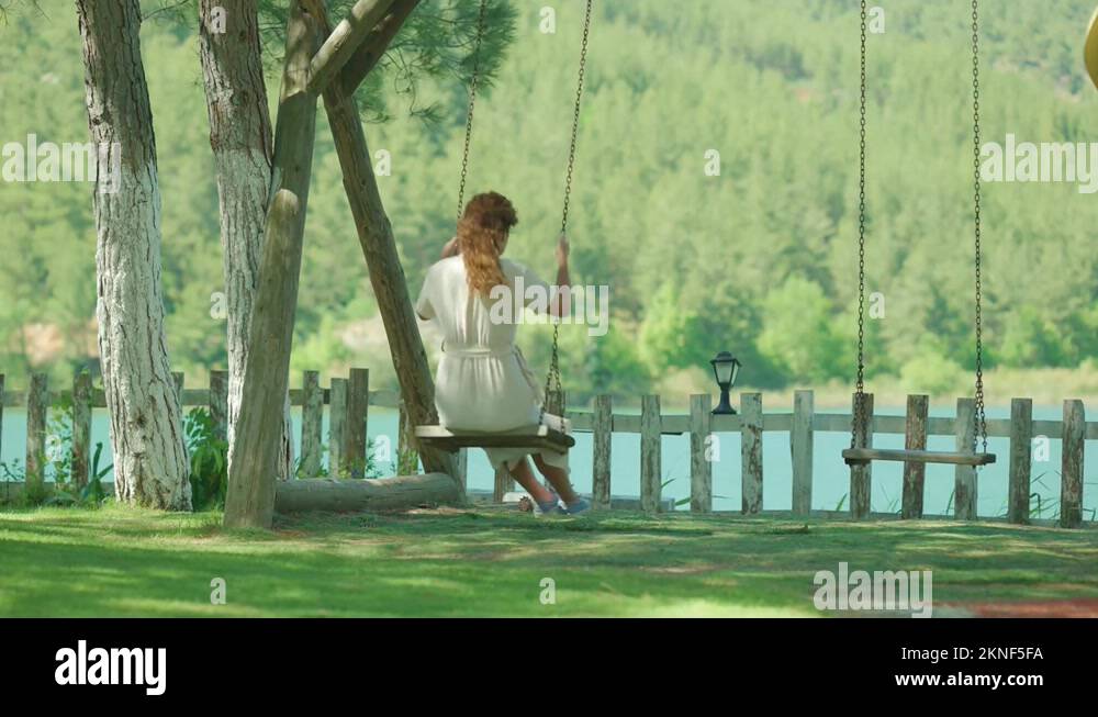 Woman swinging alone Stock Videos & Footage - HD and 4K Video Clips - Alamy