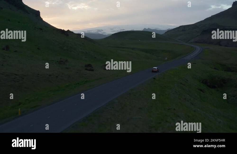 Drone view car driving the ring road in Iceland. Aerial view car driving on Stock Video Footage ...