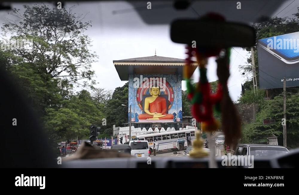 Cameraman captures the statue of Lord Buddha from inside a car while ...