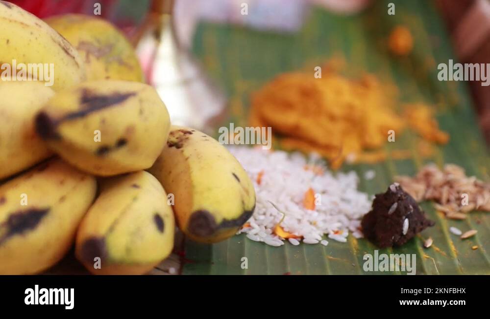 Close-up shot of fruits and rituals done during haldi, an Indian ...