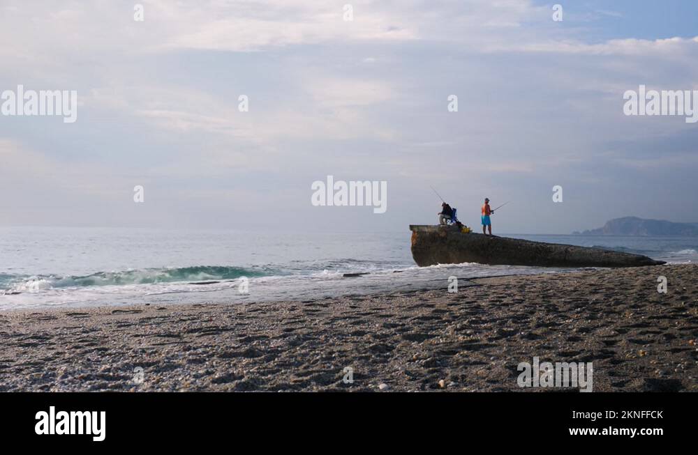 Fisherman fishing on beach Stock Videos & Footage - HD and 4K Video ...