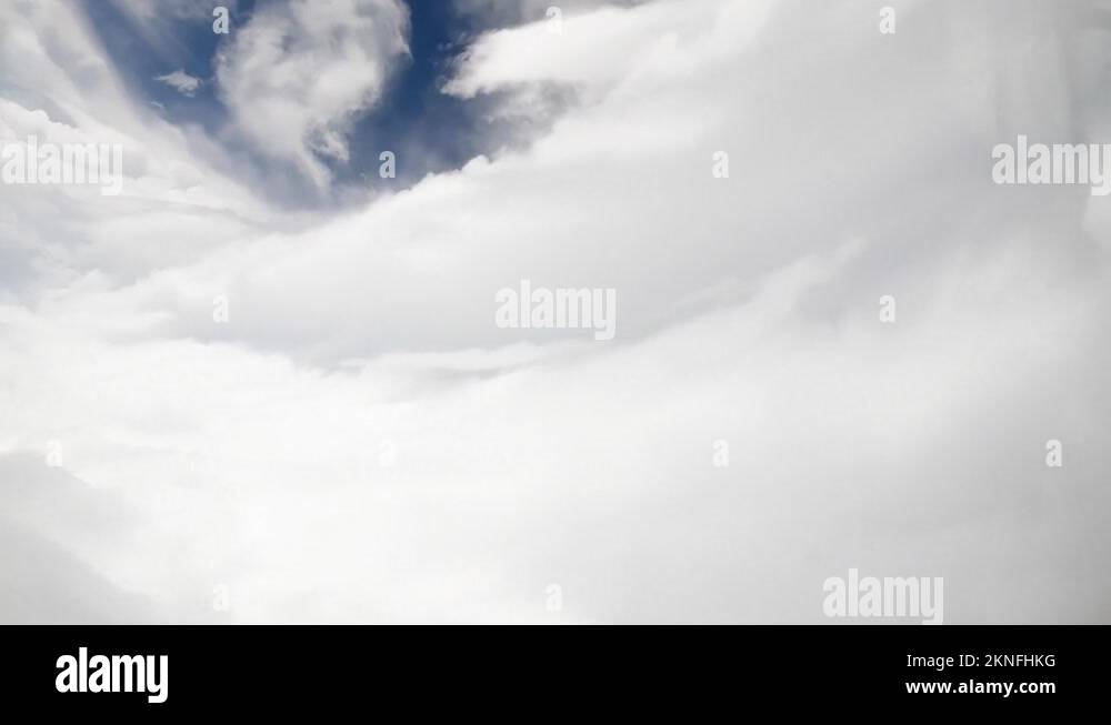 2010s: A beautiful tunnel of swirling clouds through an airplane window ...