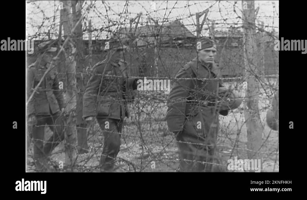 France 1940s: Military police leading Nazi soldiers in camp. Police ...
