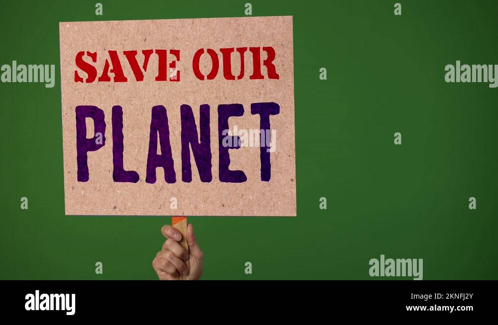 Arm holding a sign that says SAVE OUR PLANET on a green screen chroma ...