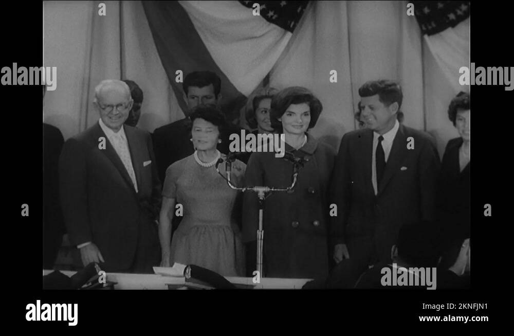 1960s: Victory celebration. John F. Kennedy walks through crowd. People ...