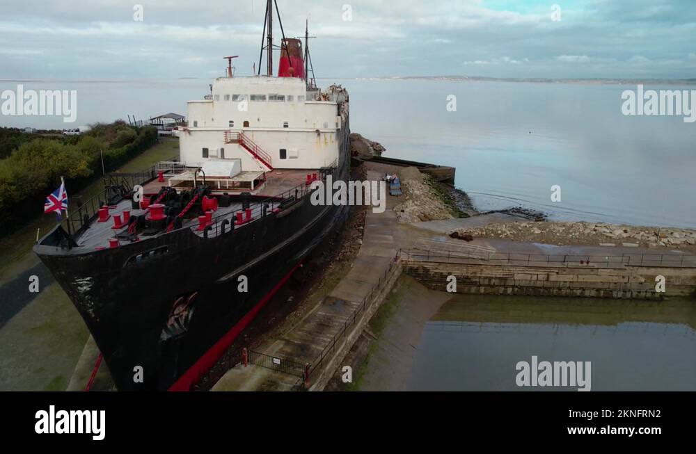 Tilt up reveal of the TSS Duke of Lancaster, also known as the Fun Ship ...