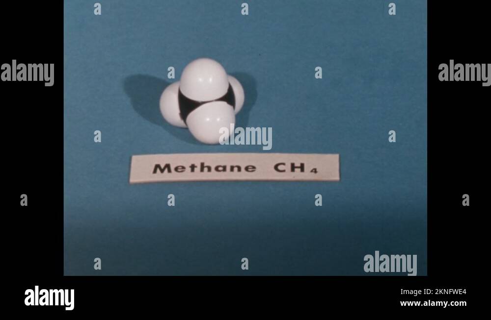 1960s: Model of a methane molecule rotates. Slate. Methane molecule ...