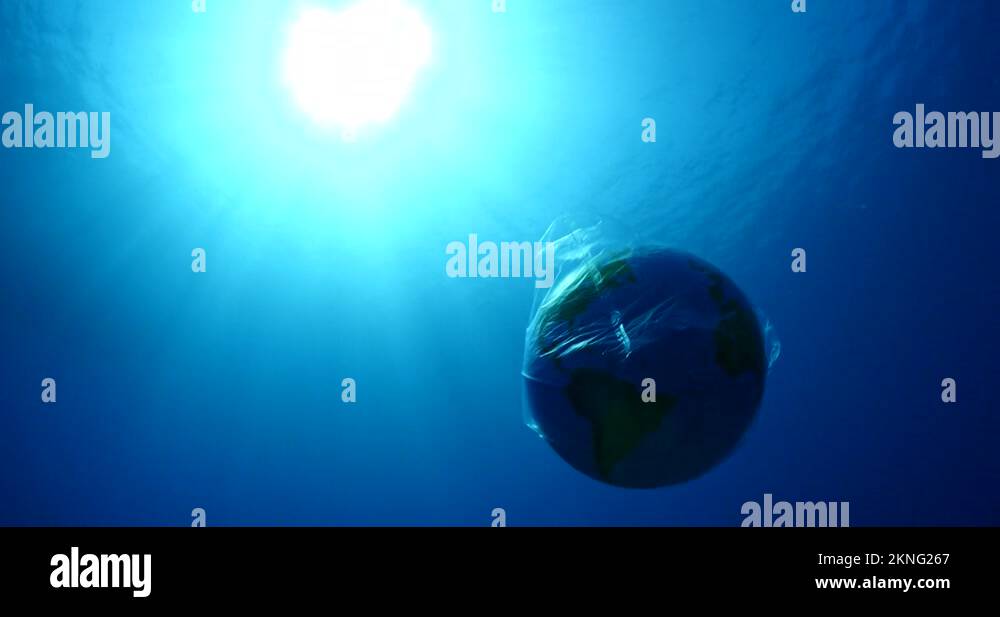 world in plastic bag underwater ocean pollution sun beams rays ...
