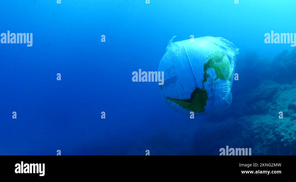 world in plastic bag underwater ocean pollution sun beams rays ...