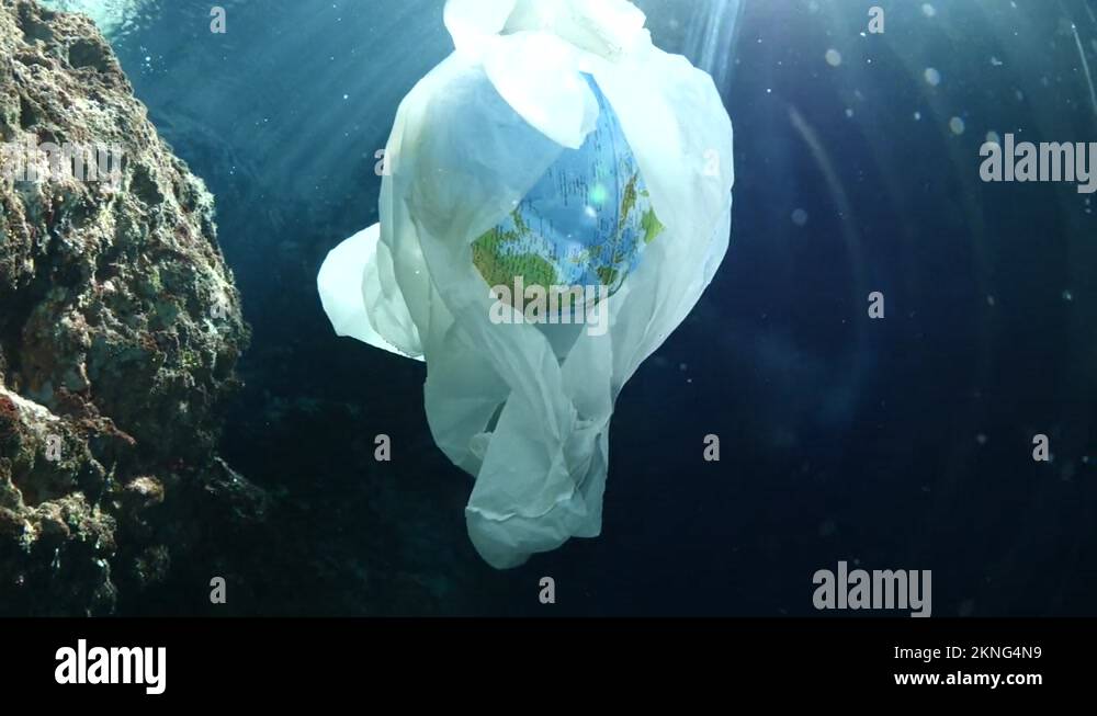 world in plastic bag underwater ocean pollution sun beams rays ...