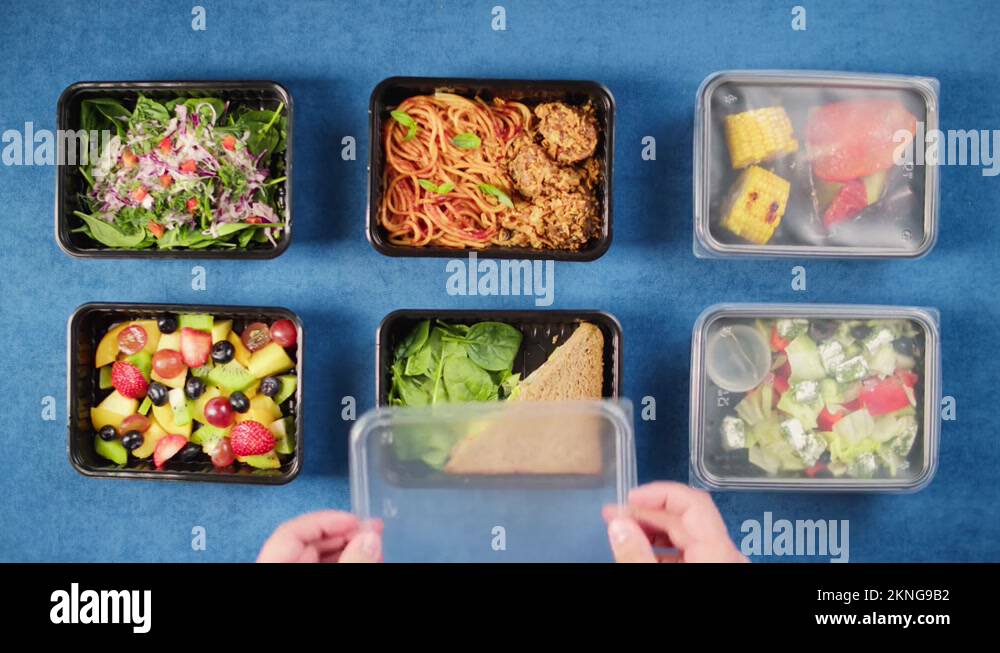 Closing take away meals top view, Food delivery in disposable ...