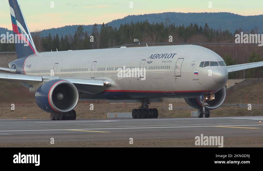airplane aeroflot boeing 777 taxiing turning line up runway oslo ...