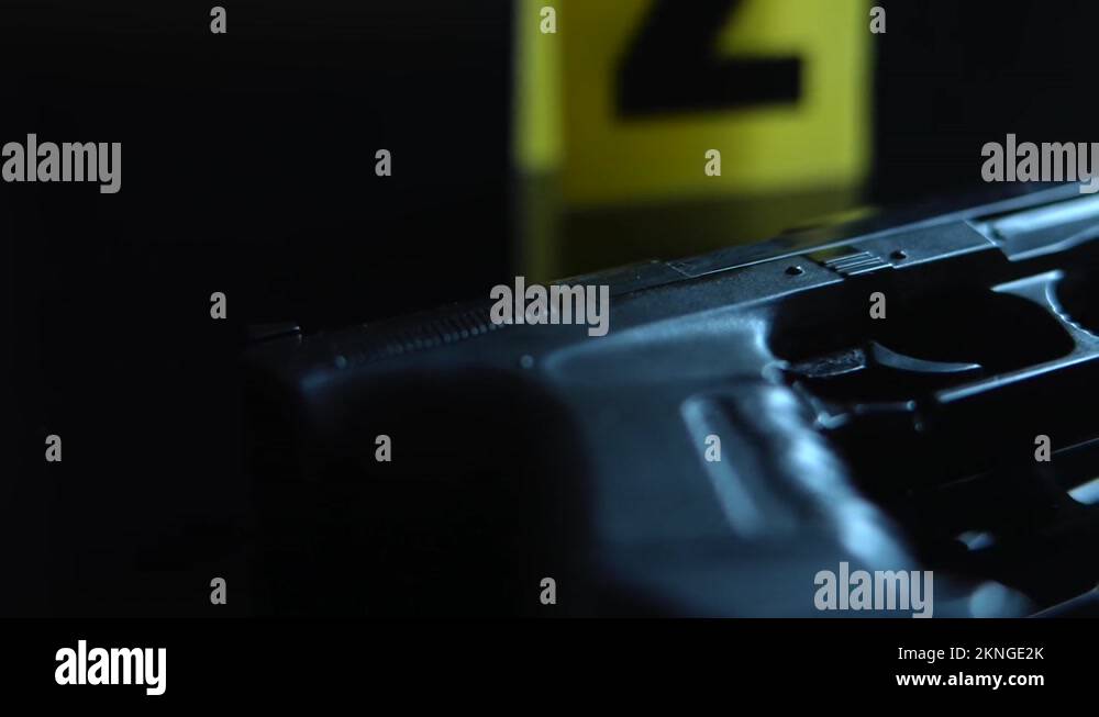 Gun At Crime Scene, Murder Weapon With Evidence Markers, CSI Stock ...