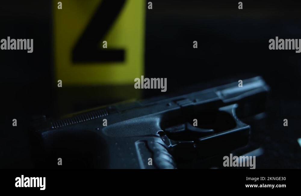 Gun At Crime Scene, Murder Weapon With Evidence Markers, CSI Stock ...