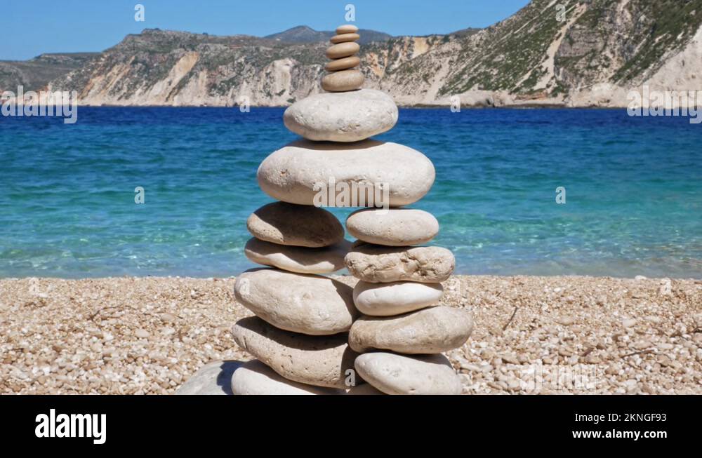 Stones pebbles stacks on beach coast in Agia Kiriaki, Milos island ...