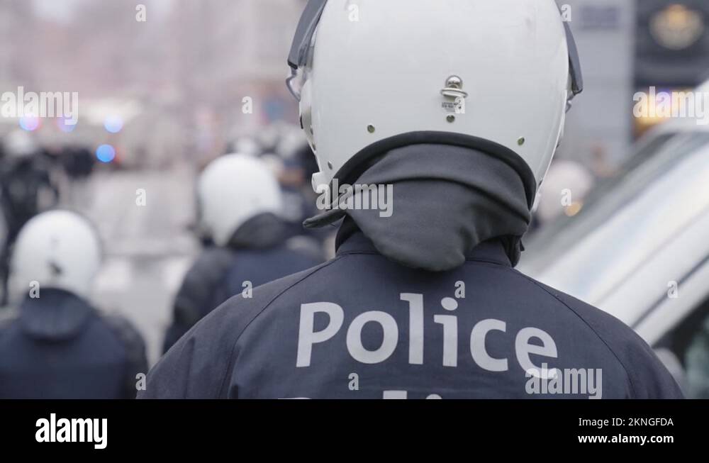 Back view police Stock Videos & Footage - HD and 4K Video Clips - Alamy