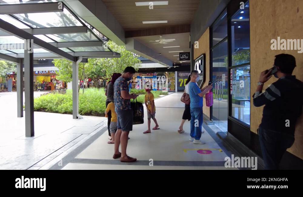 People wear face mask scan MySejahtera apps and enter Original Classic ...