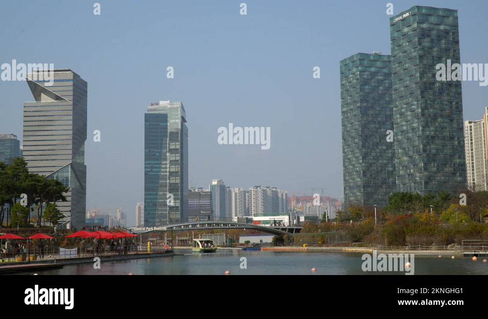 Moden Urban Skyline of Songdo Central Park, G Tower - People Travel by ...