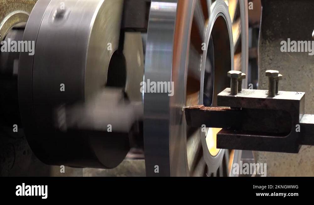 Lathe Machine Processing A Metal Part In A Train Factory - Zoom Out ...