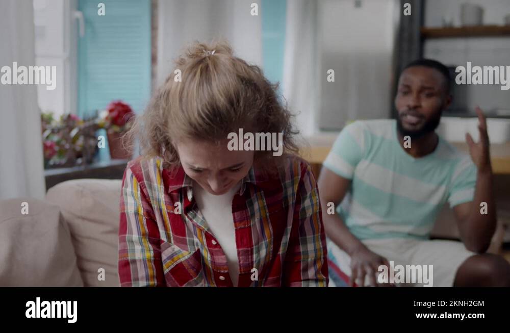 Angry African-American ethnicity man yell at sad girlfriend at home. Realtime Stock Video ...