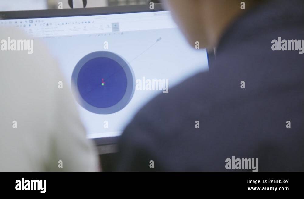 Students working on computers and tablets in a french international ...