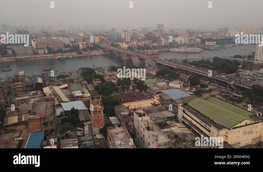 Low aerial pull out over the slums and poverty stricken areas of Old ...