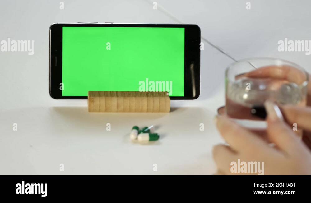 Handheld Camera: Back View of Brunette woman Holding Chroma Key Green ...