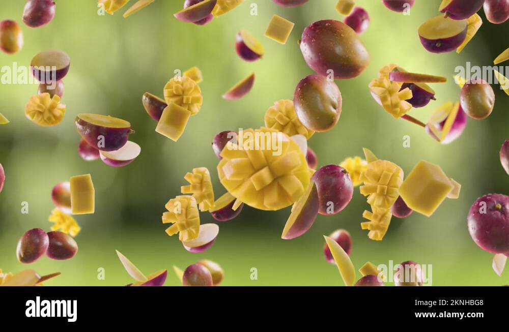 Mango with Slices Falling on Garden Background Stock Video Footage - Alamy