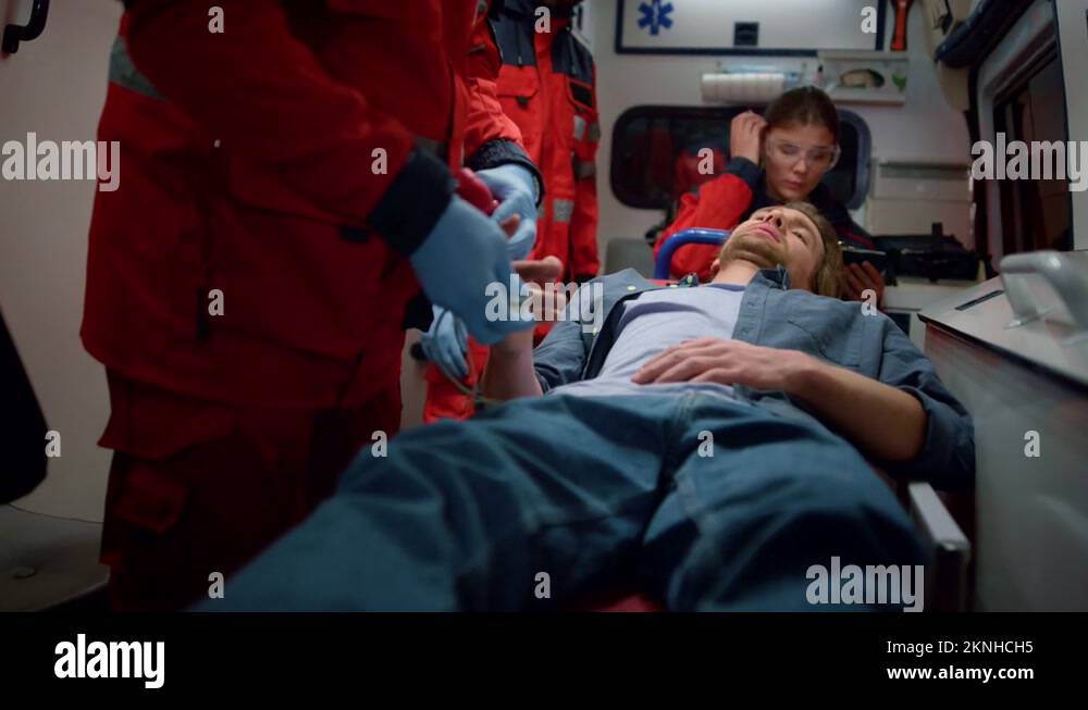 Paramedics checking Stock Videos & Footage - HD and 4K Video Clips - Alamy