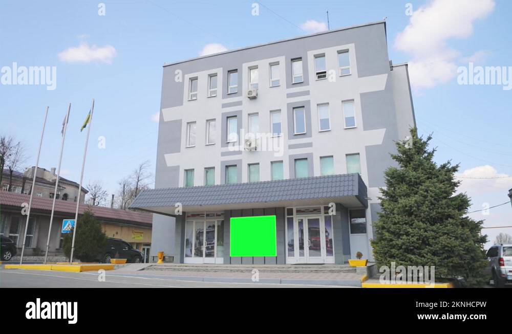 Modern office with advertising template. Office building with green ...