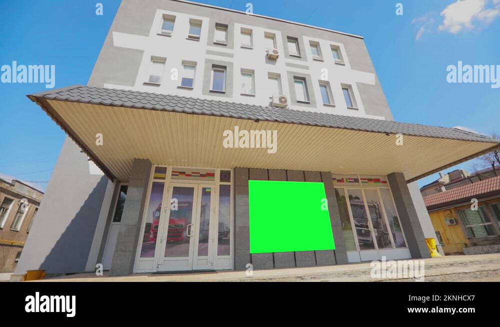 Office building with green screen. advertising banner green screen. An ...