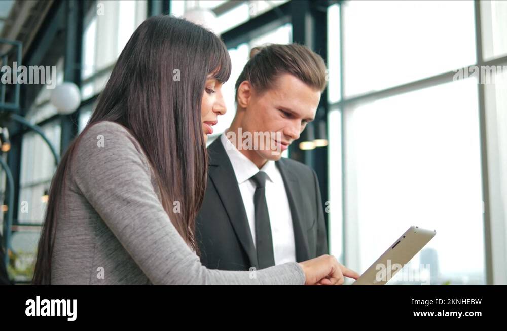 Teamwork two people working working together Stock Videos & Footage ...