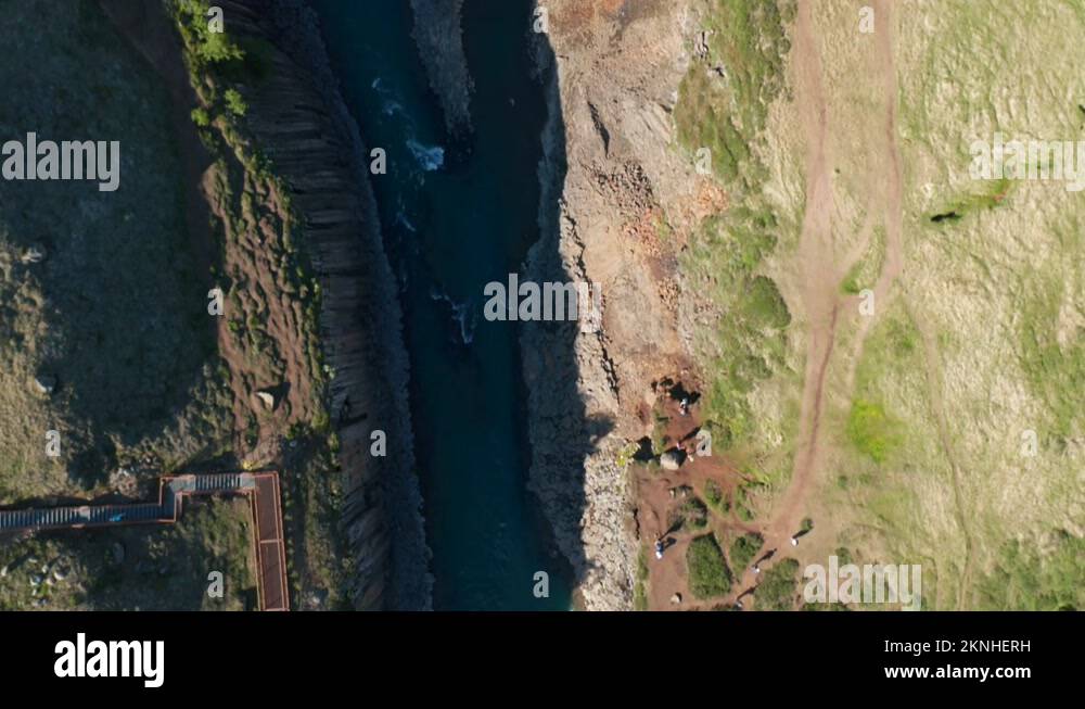 Top down view of Stuolagil, a majestic canyon with volcanic basalt ...