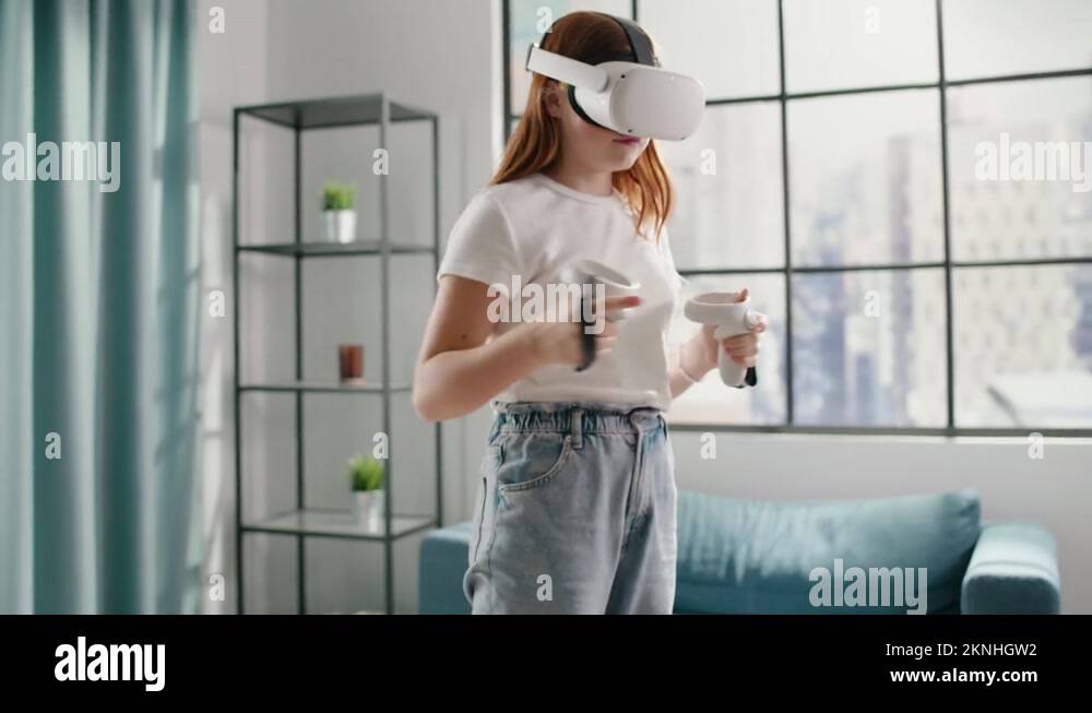 Teenage Girl With Controllers Tests Online Game Moving Hands Stock