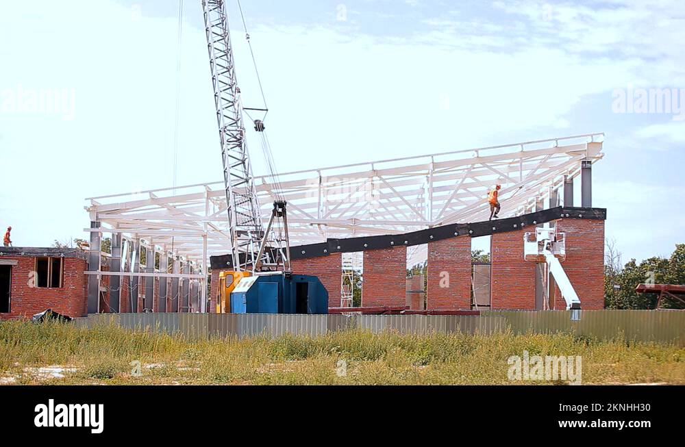 Building construction process. Construction site. Working process at a ...