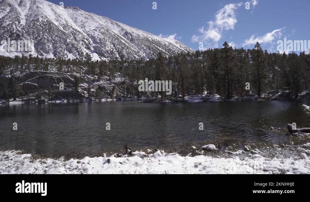 Frozen lake thawing out as temperature rises in the afternoon Stock ...