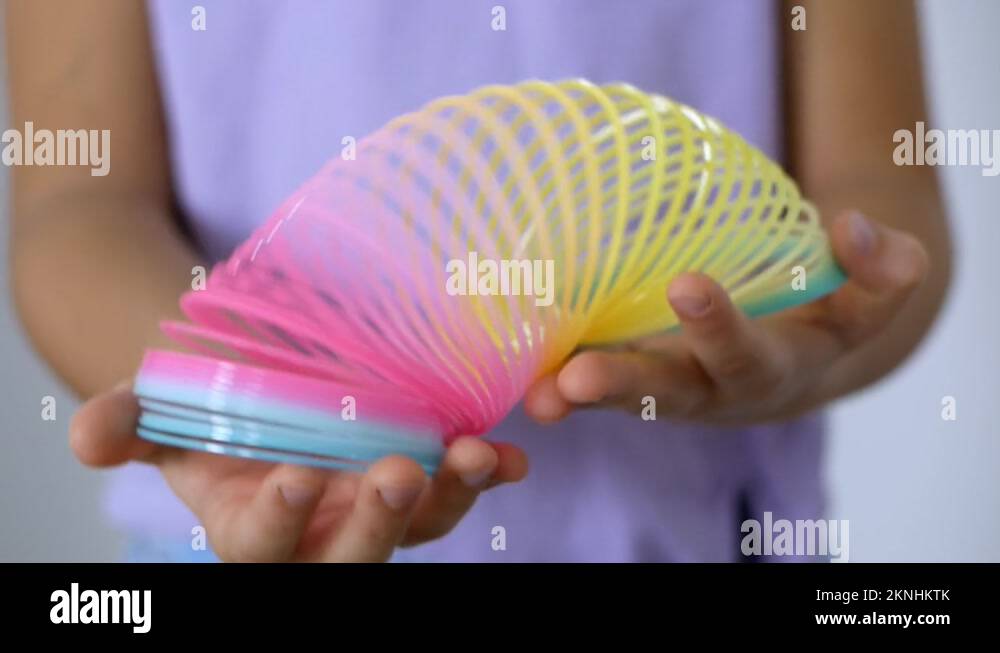 Trend Slinky rainbow toy from the '90s. A multicolored children's ...
