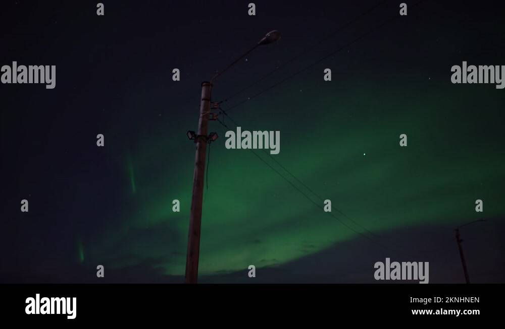 Aurora borealis behind electrical lines realtime Stock Video Footage ...