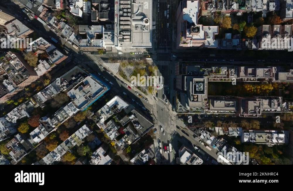 Aerial birds eye overhead top down footage of traffic in streets on ...