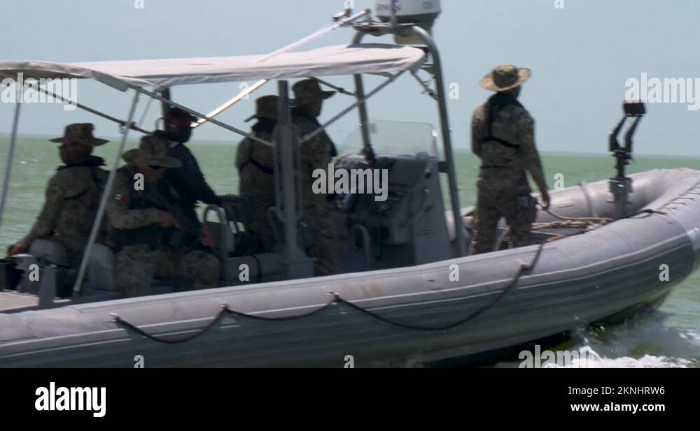 Mexican marines patrol the Ciudad del Carmen bay aboard a speed boat ...