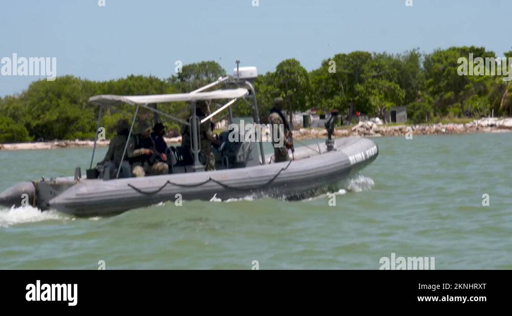 Mexican marines patrol the Ciudad del Carmen bay aboard a speed boat ...