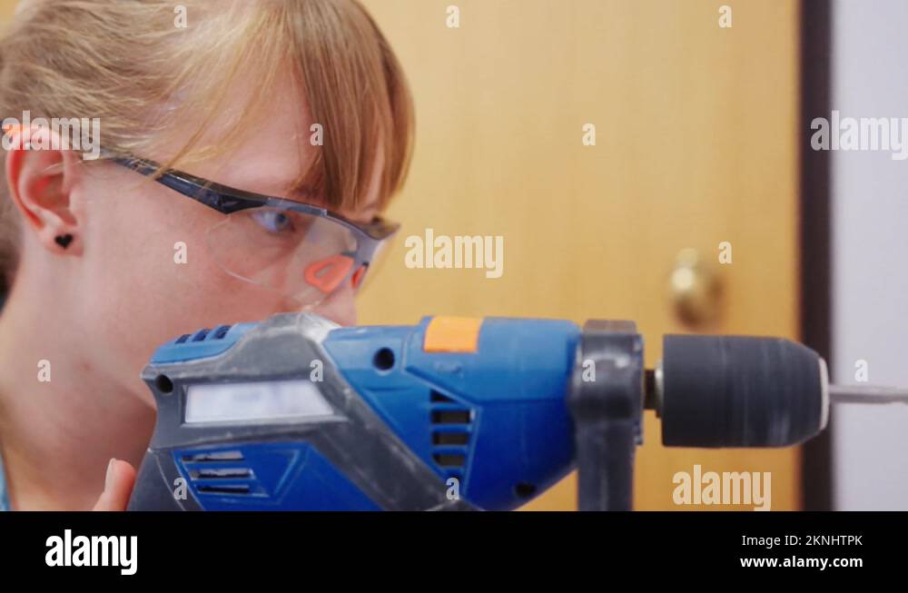 Woman using power drill Stock Videos & Footage - HD and 4K Video Clips ...