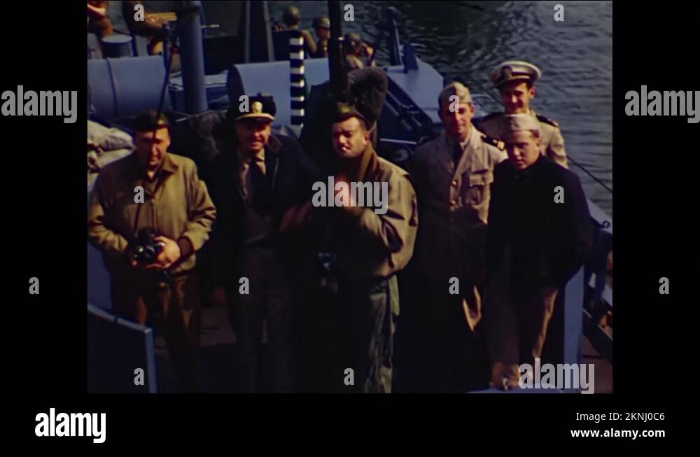 1940s: soldiers on boats idling in river, soldier showing camera to ...