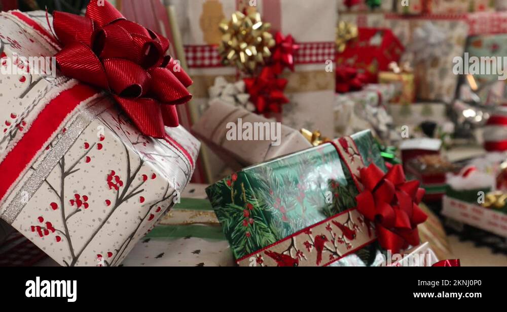 Huge pile of Christmas presents with train running in background. 4K ...