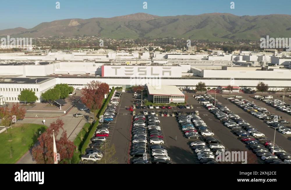 Tesla factory, Aerial zoom out Electric vehicle factory Fremont ...