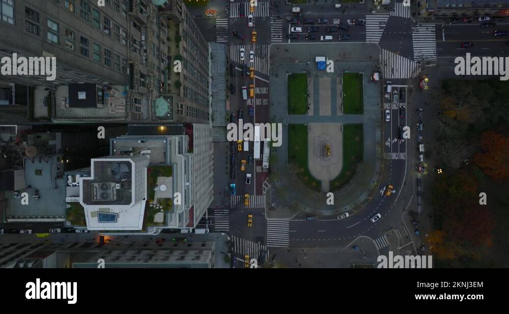 Aerial birds eye overhead top down panning shot of busy streets and ...
